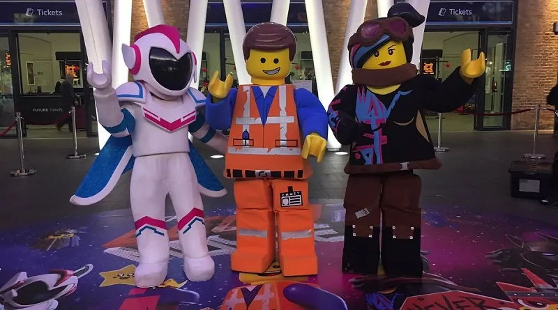 Pink Singers choir sing The LEGO Movie 2 songs for commuters at Kings Cross