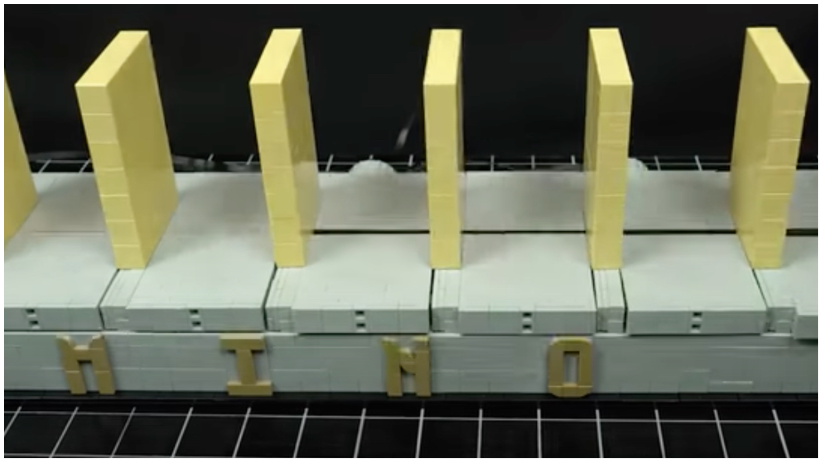 Perpetual LEGO domino toppling machine is hypnotic