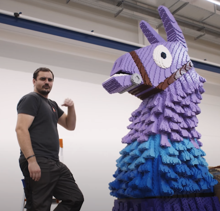 Behind the building of the giant LEGO Fortnite Llamas