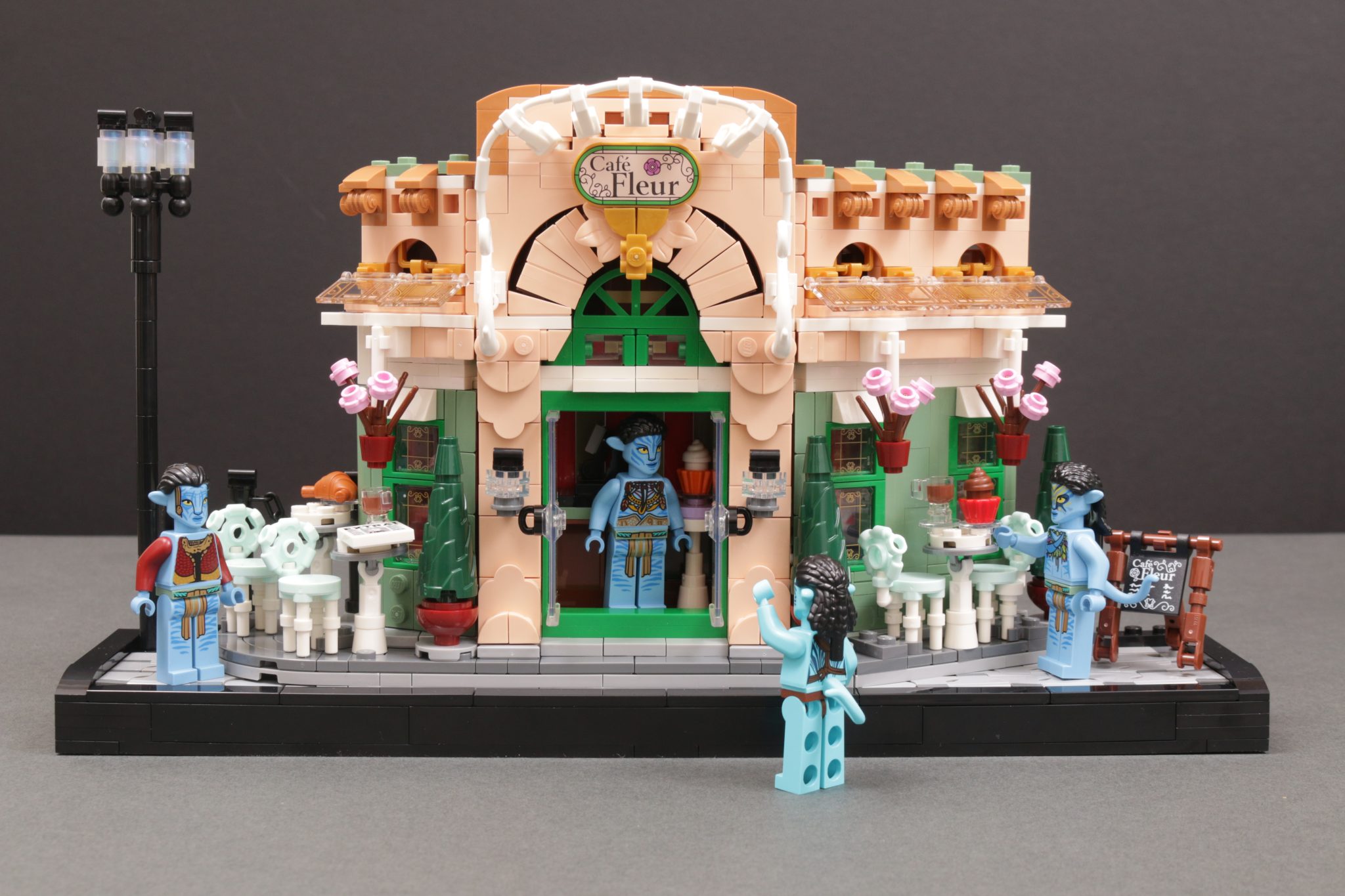 Is LEGO Icons 10362 French Café to scale with minifigures?