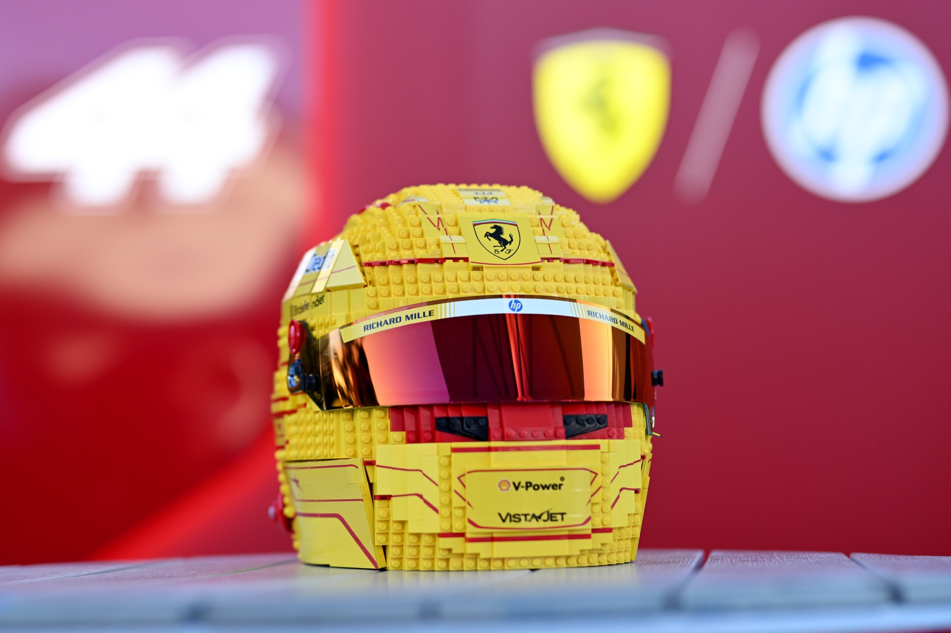 Ferrari Formula 1 drivers pose with life-sized LEGO helmets
