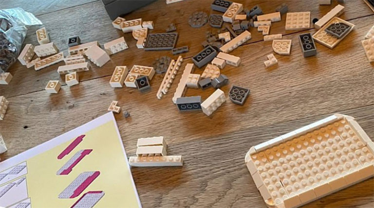 David Beckham builds a LEGO model of his aftershave brand