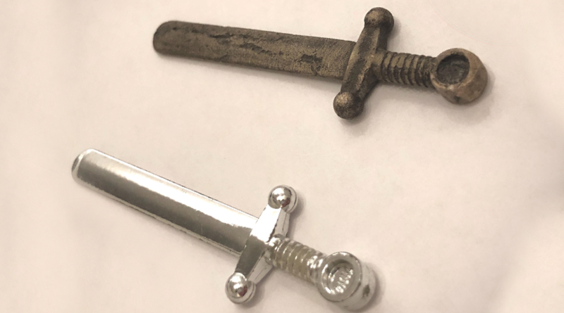 How does a LEGO sword compare to one 25 years old and made of real silver?